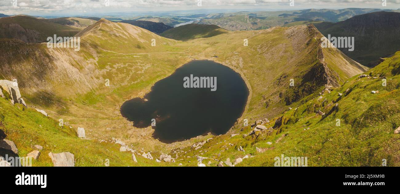 Natural panoramic landscape from Helvellyn Edge, and the small lake Red ...