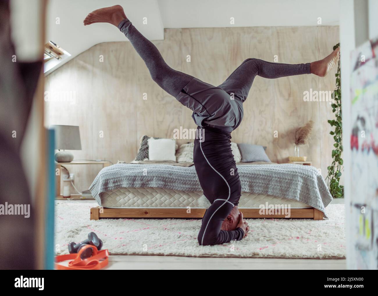 Man headstand hi-res stock photography and images - Alamy