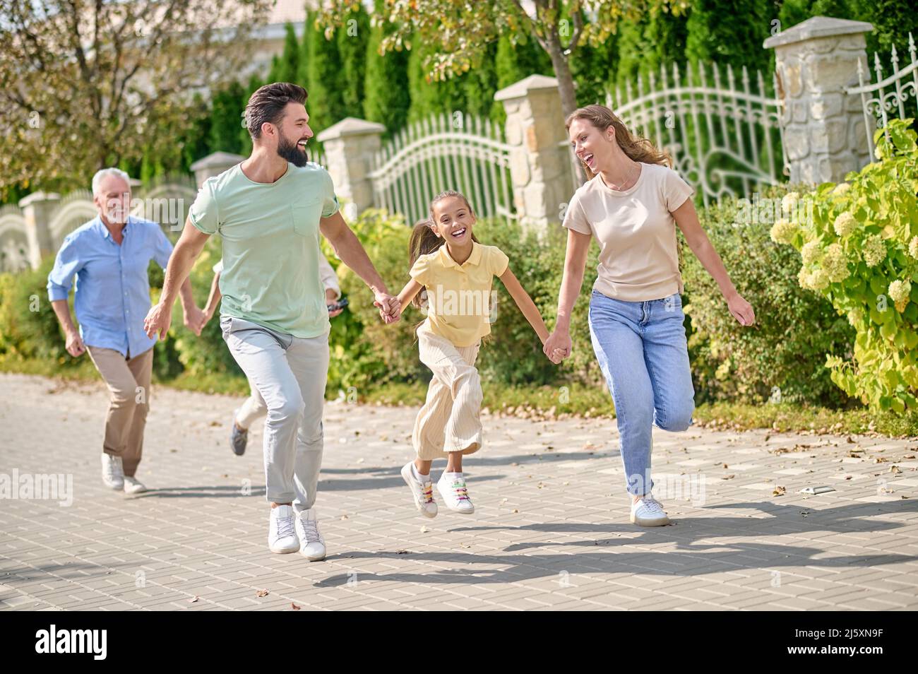 Happy family enjoying rest hi-res stock photography and images - Alamy