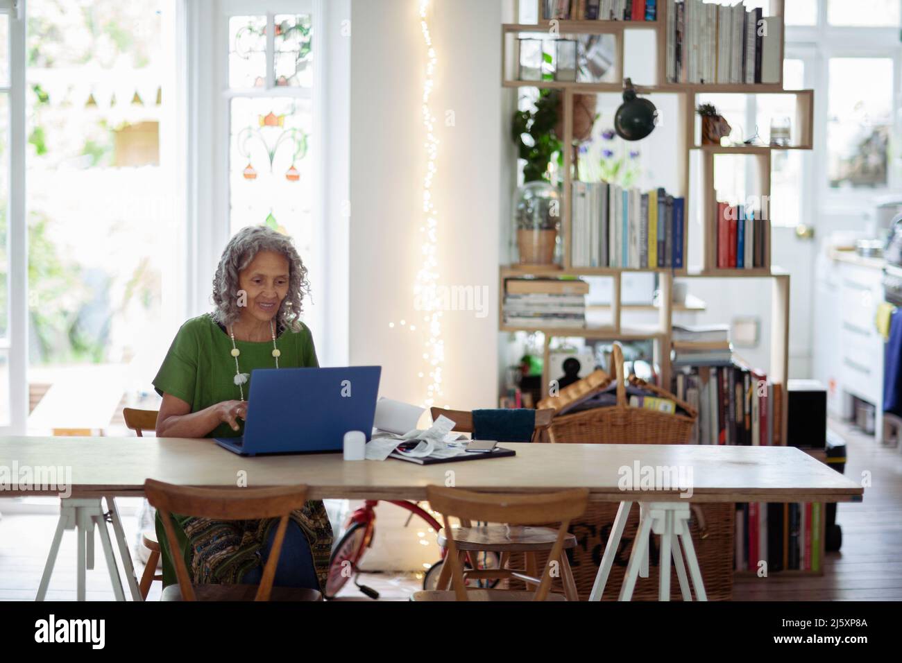 Woman receipt on laptop hi-res stock photography and images - Alamy