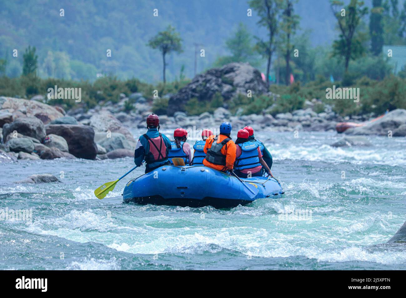 Srinagar, India. 25th Apr, 2022. Indian tourists are seen rafting in a ...