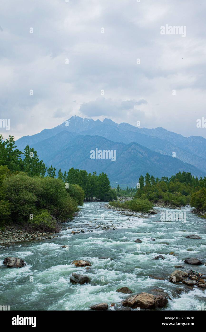 General view of Lidder river in the backdrop of mountains in Pahalgam a ...