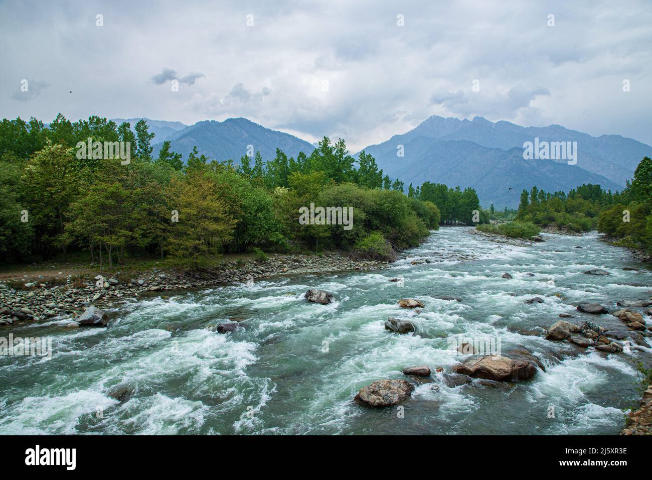 General view of Lidder river in the backdrop of mountains in Pahalgam a ...