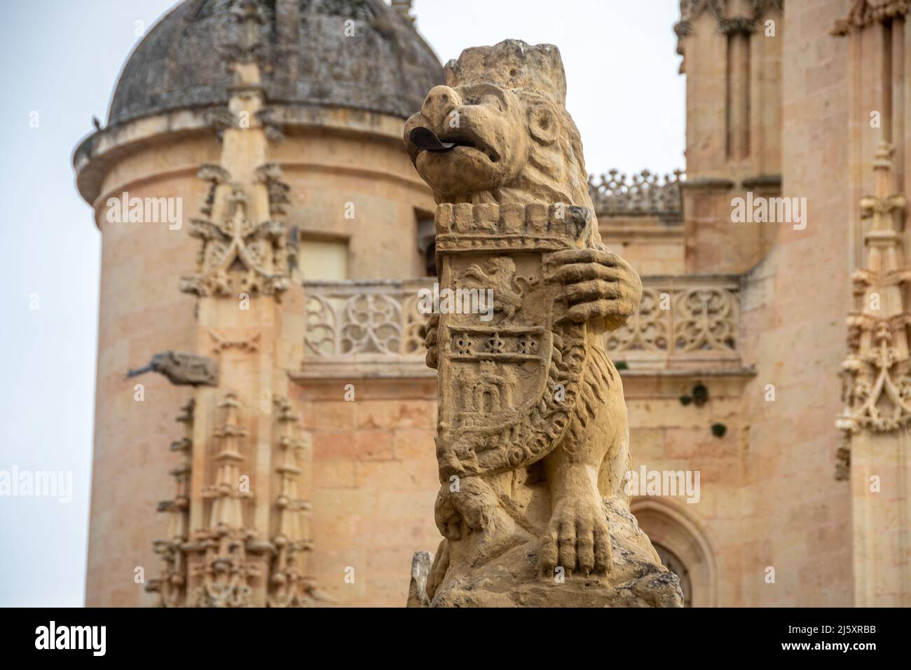 A stone statue of a lion outside of Segovia Cathedral Segovia, Spain ...