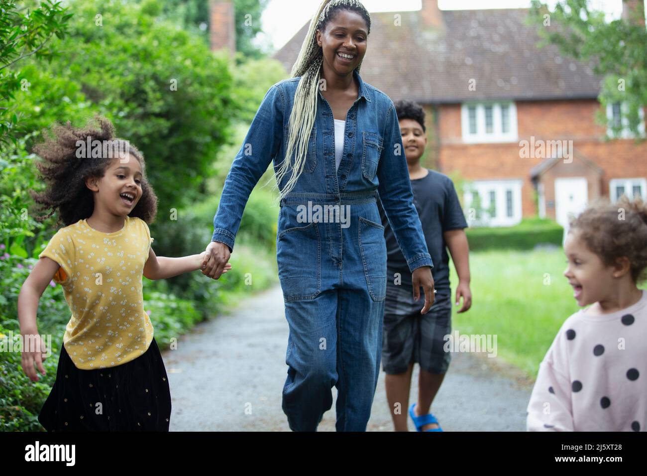 Children adult walking together on hi-res stock photography and images ...