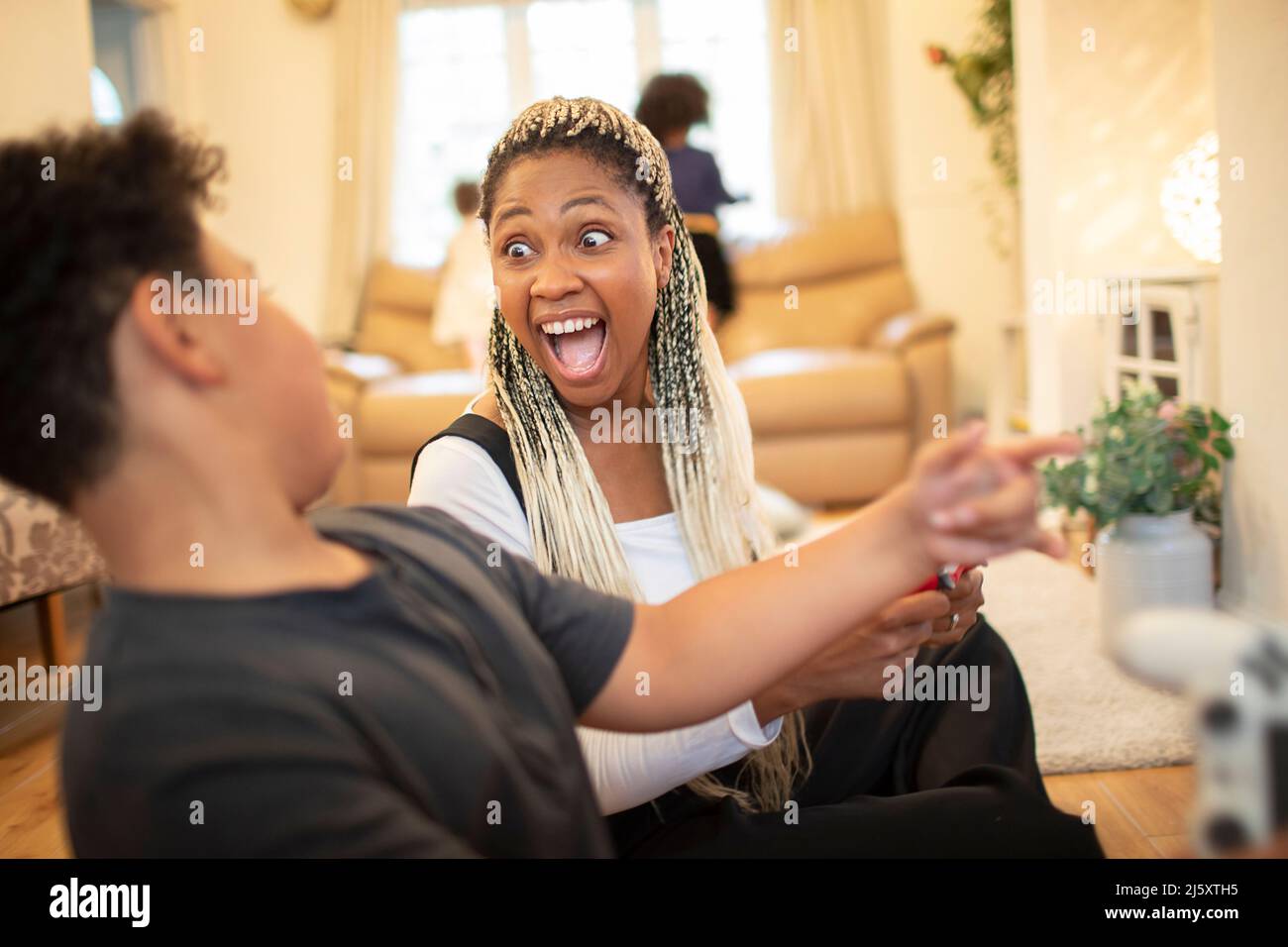 Playful gaming mother son hi-res stock photography and images - Alamy
