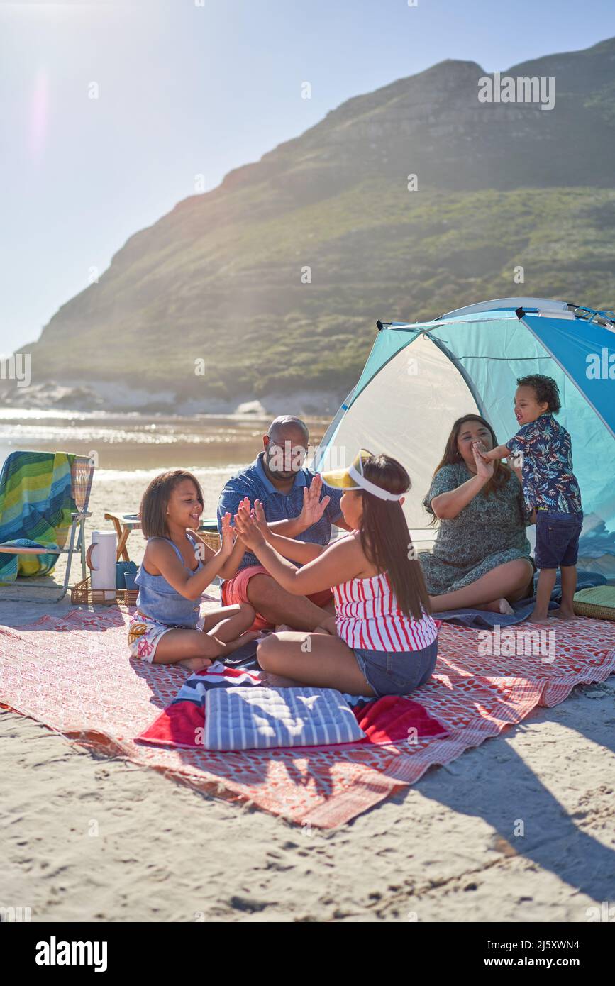 Family on beach playing together hi-res stock photography and images ...