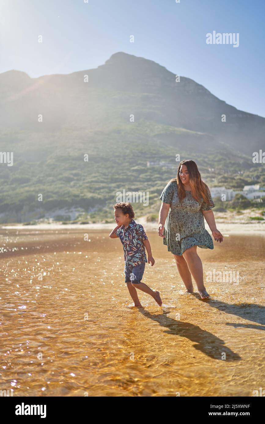 Woman chasing boy hi-res stock photography and images - Alamy
