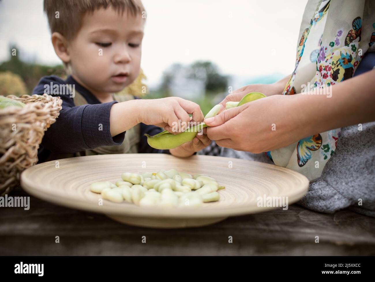 Boy eating beans hi-res stock photography and images - Alamy