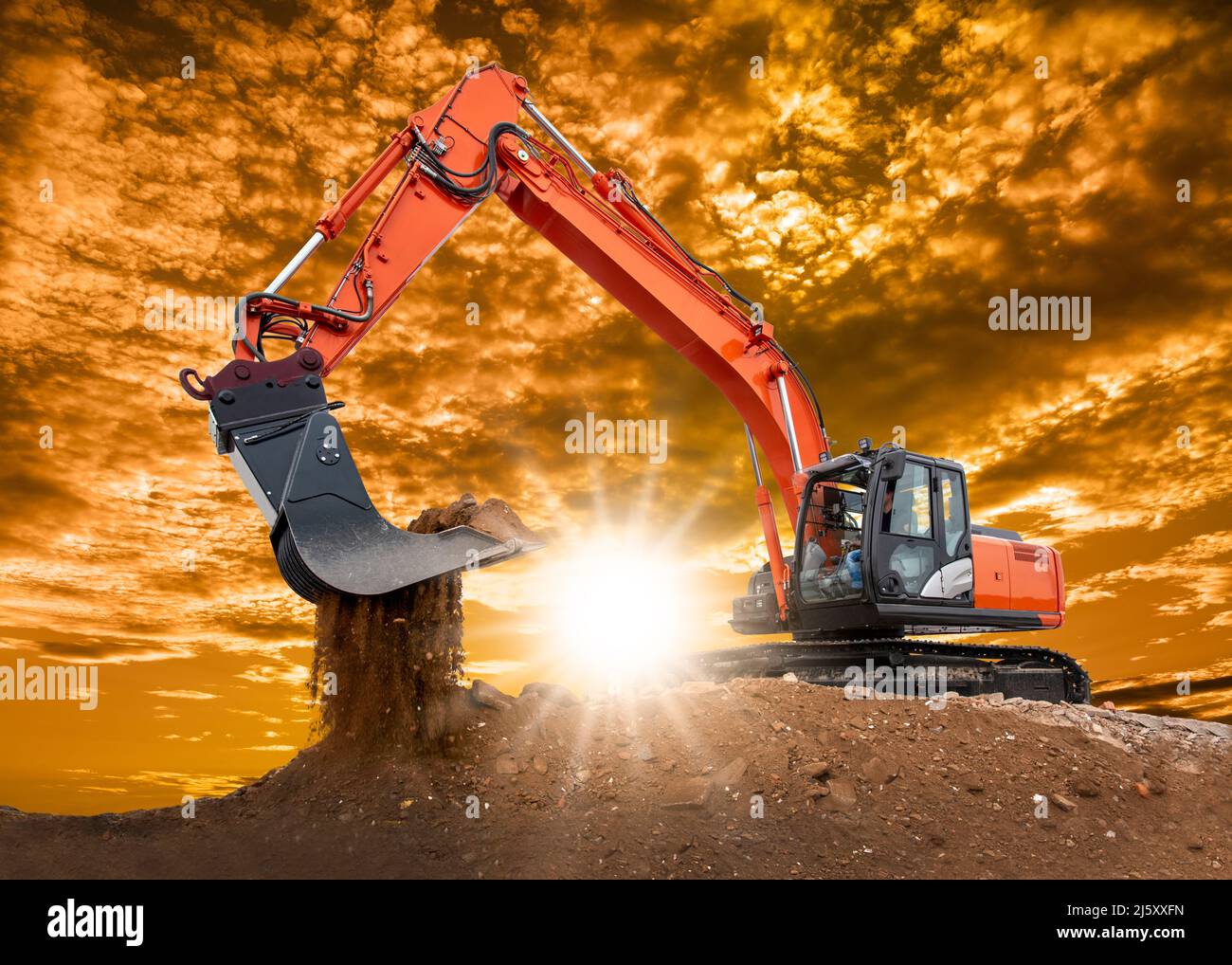 excavator digging on construction site Stock Photo - Alamy
