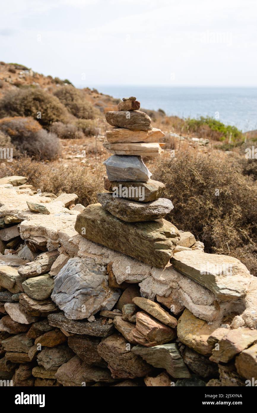 A composition of stones arranged on the coast of Ios Island. Cyclades ...