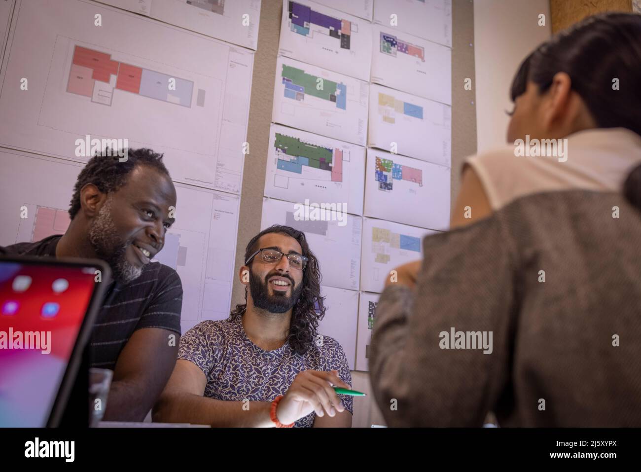 Building design architects meeting in office Stock Photo - Alamy