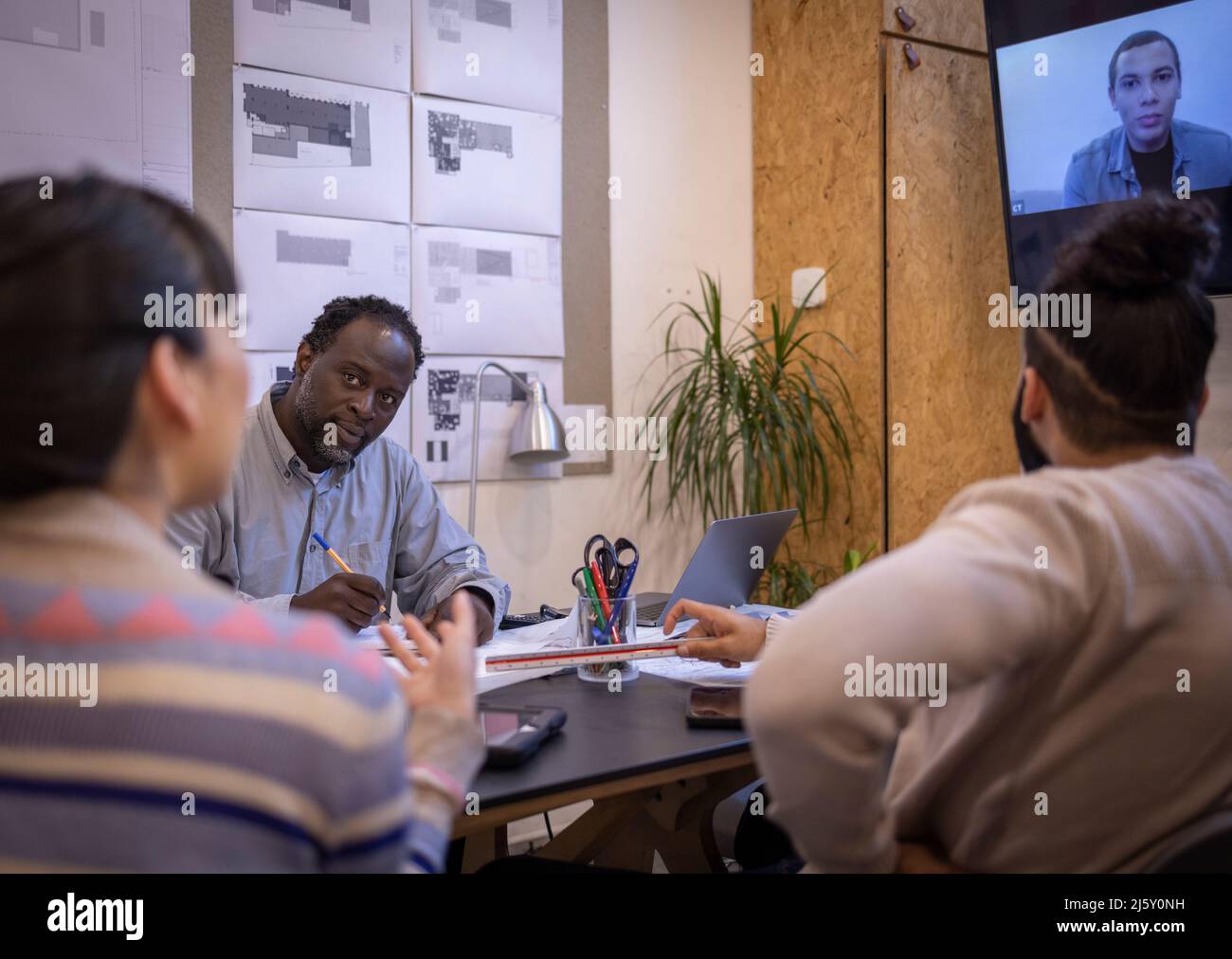 Architects video conferencing in office meeting Stock Photo - Alamy