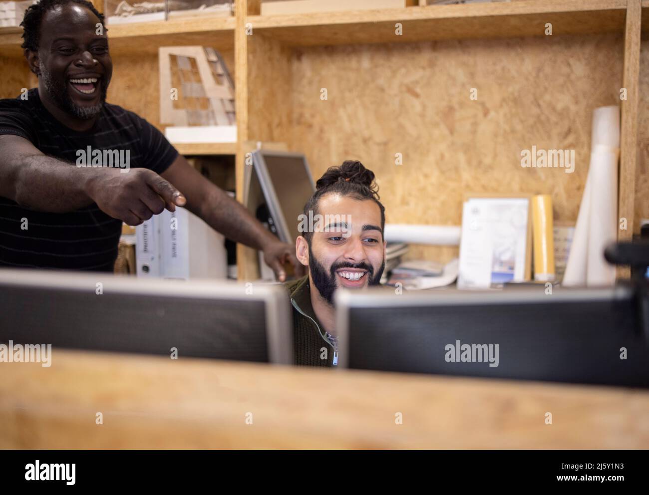 Laughing working hi-res stock photography and images - Alamy