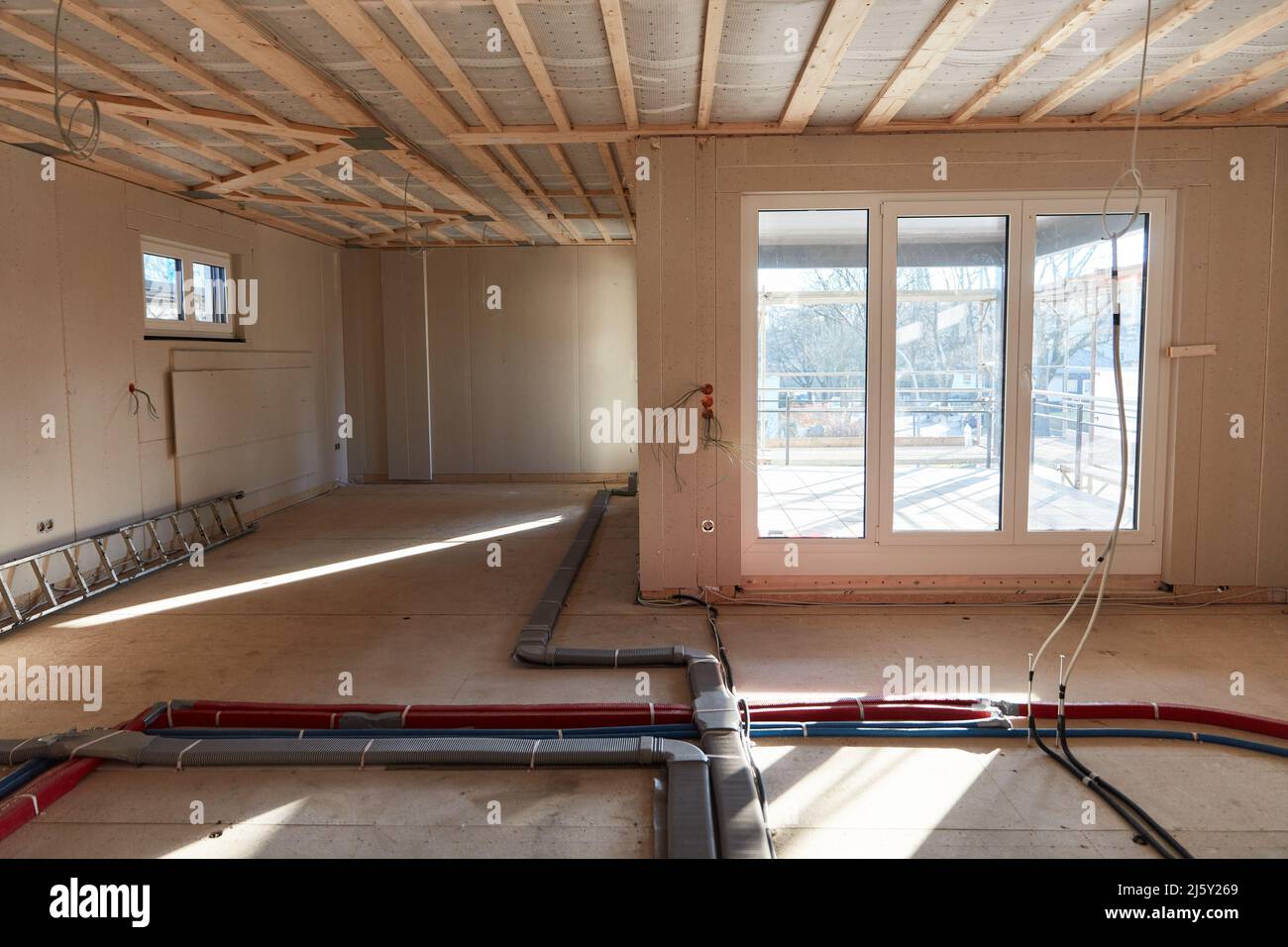 Large room with a terrace or balcony as a construction site when ...