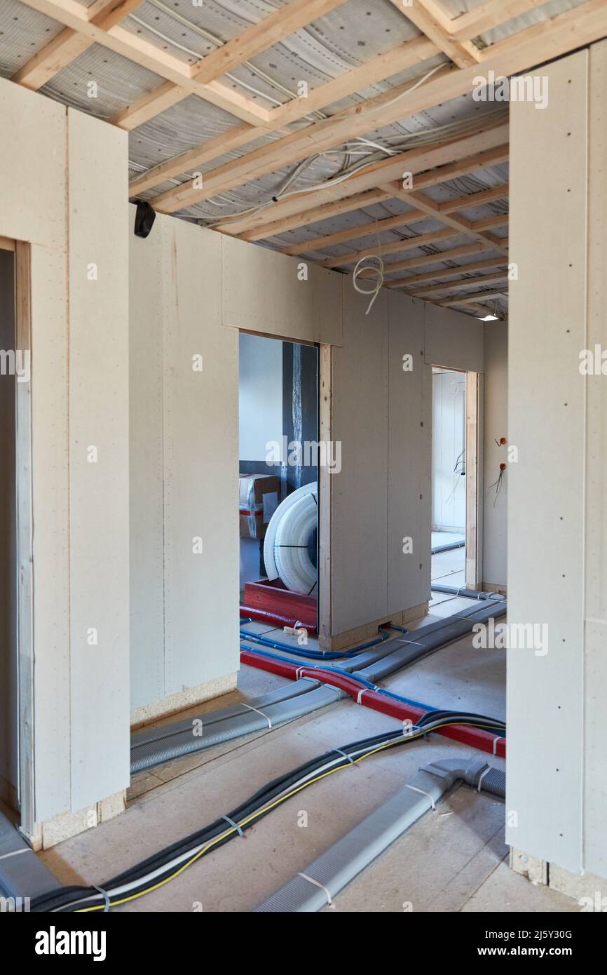 Corridor or hallway with doorways as construction site in new house ...