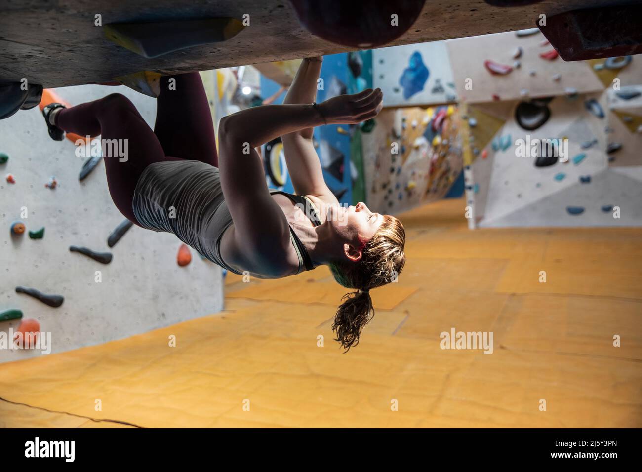 Woman hanging upside down from hi-res stock photography and images - Alamy