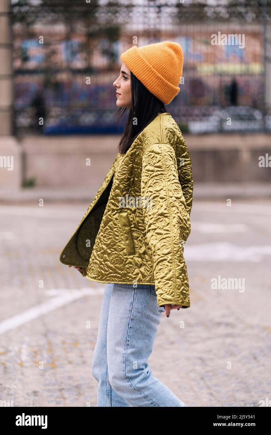 From above back view of unrecognizable female adventurer standing on ...