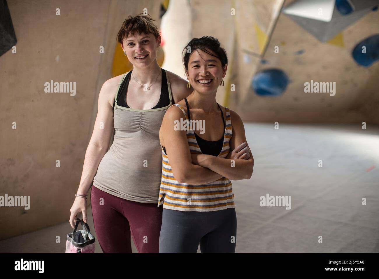 Portrait confident female rock climbers in climbing gym Stock Photo - Alamy