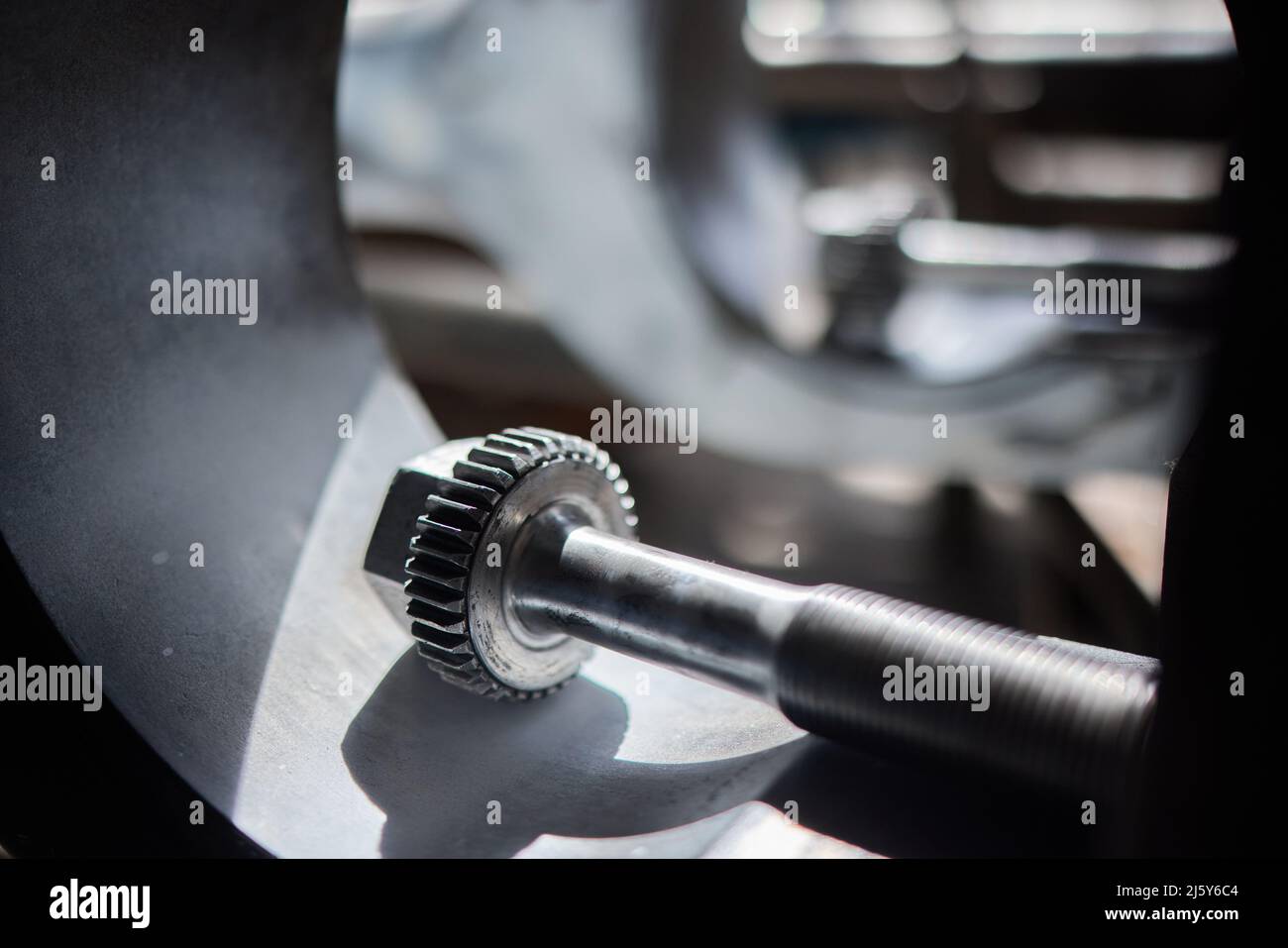 Close up of the CNC lathe jaw clamping raw material steel rod .Steel ...
