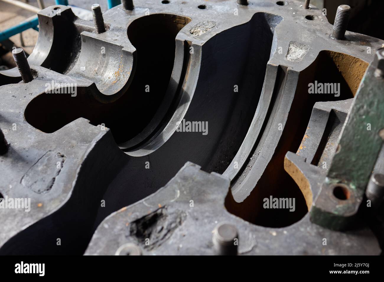 Close up of the CNC lathe jaw clamping raw material steel rod .Steel ...