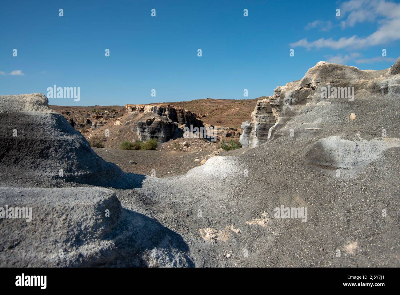 Rock formations remain after the erosion made by wind has taken some ...