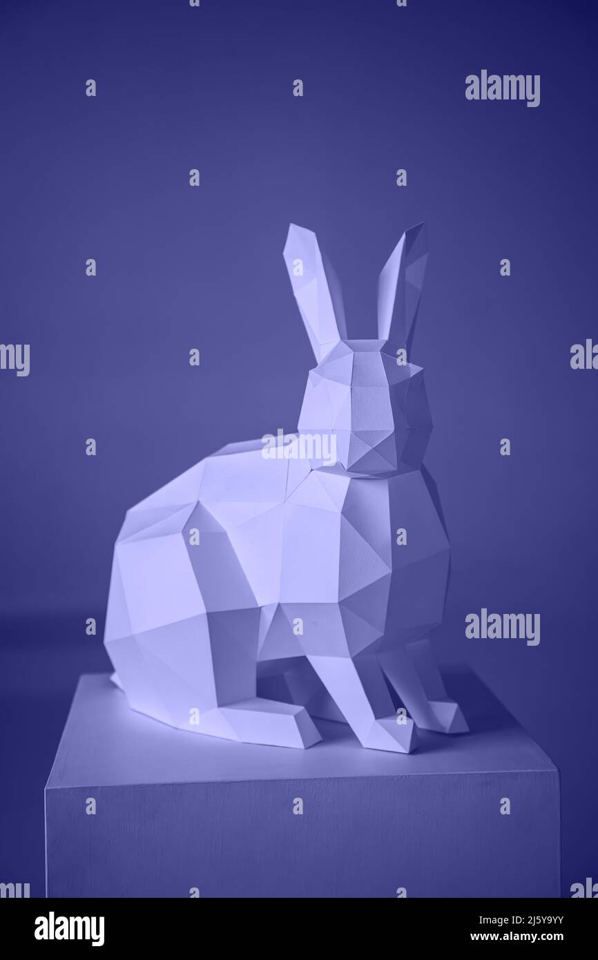 very peri rabbit made of paper in the papercraft technique. Easter ...