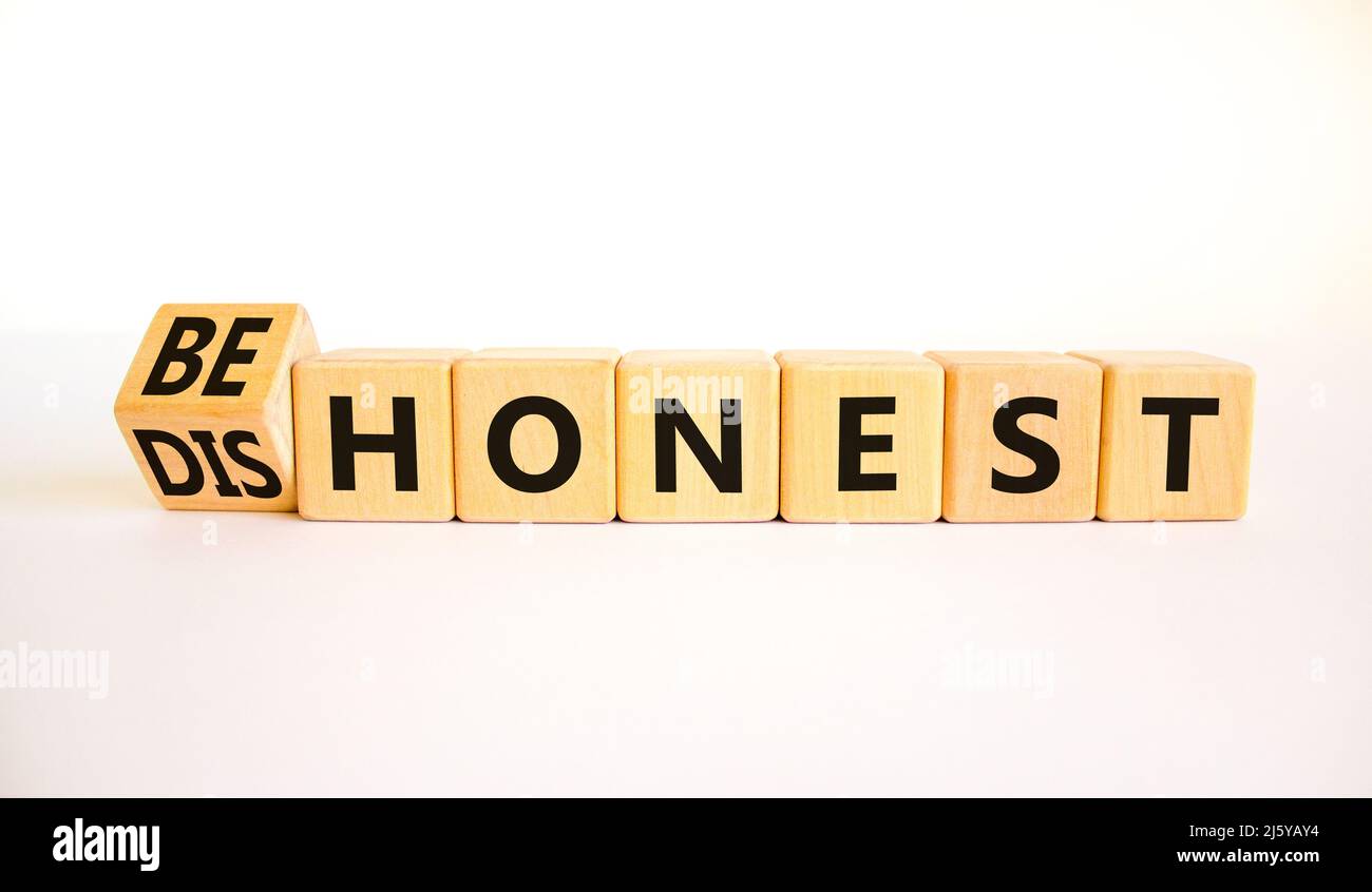 Be honest or dishonest symbol. Turned cube and changed concept words ...
