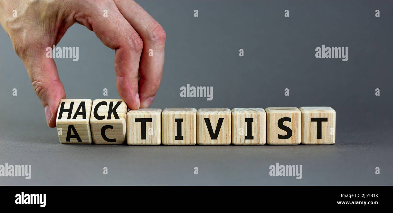 Activist or hacktivist symbol. Businessman turns wooden cubes and ...