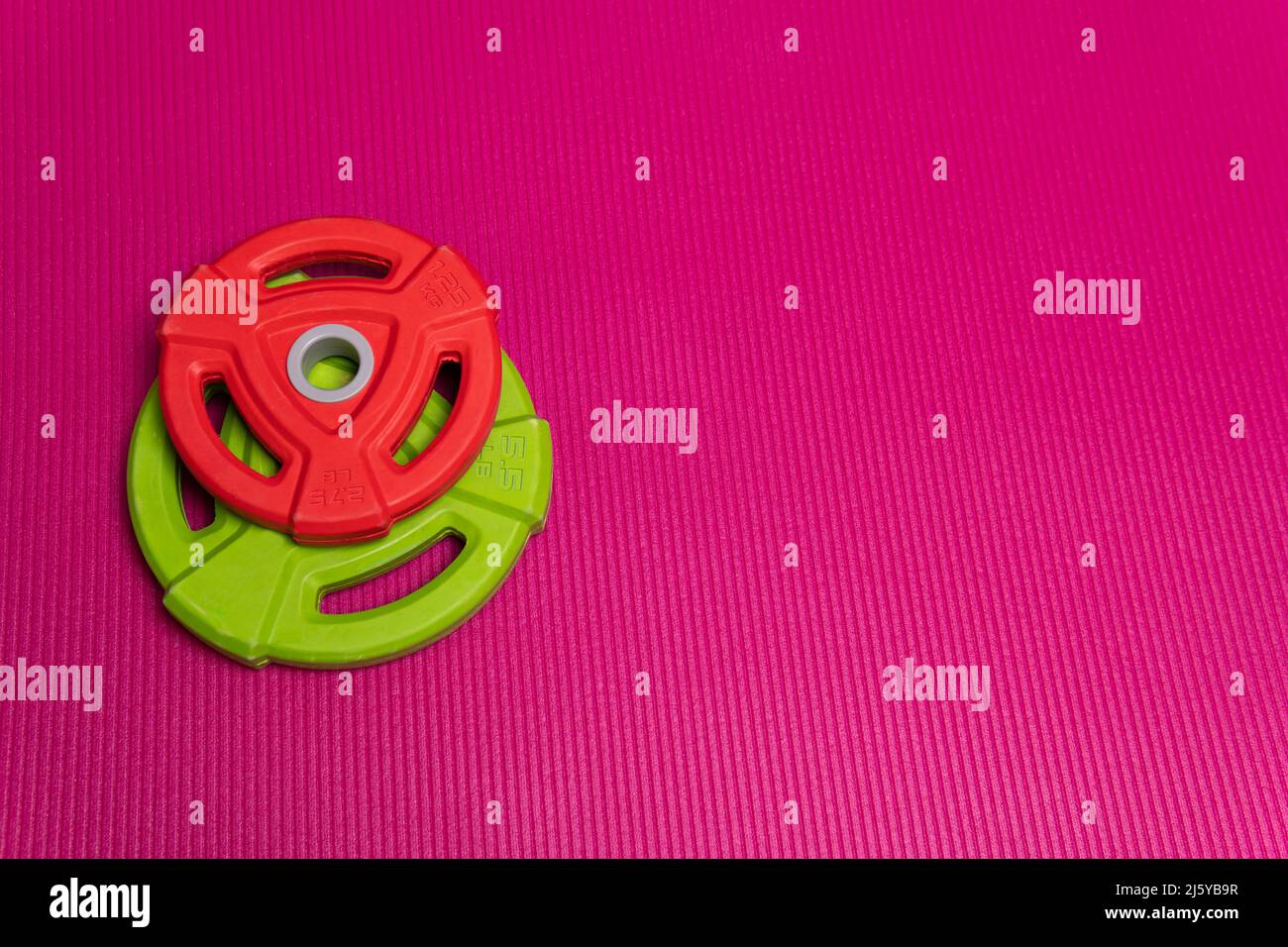 Pancakes green red equipment sport metal steel gym training, concept ...