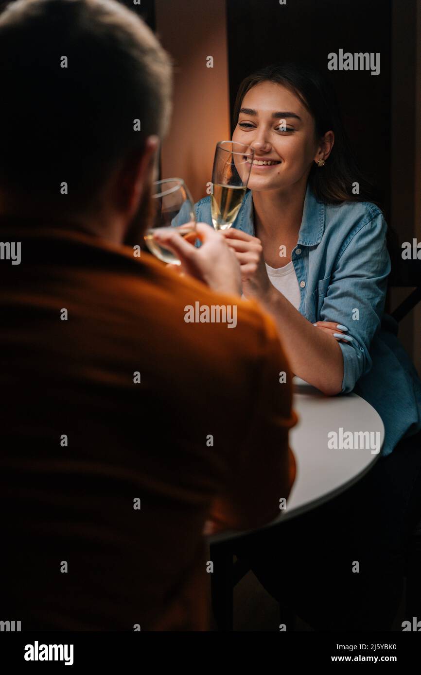 Shot glasses clinking hi-res stock photography and images - Alamy