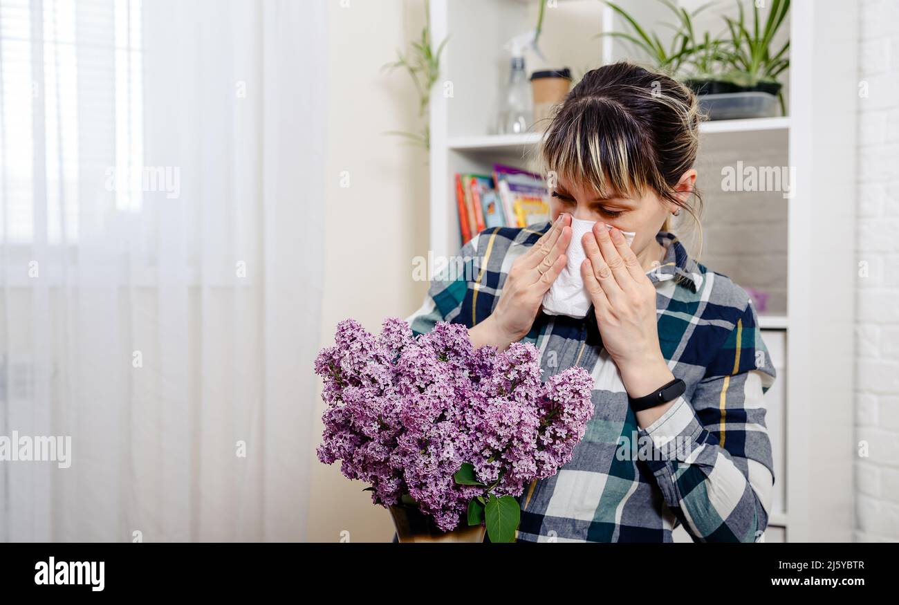 Seasonal allergy concept. Young girl with allergy isolated on white ...