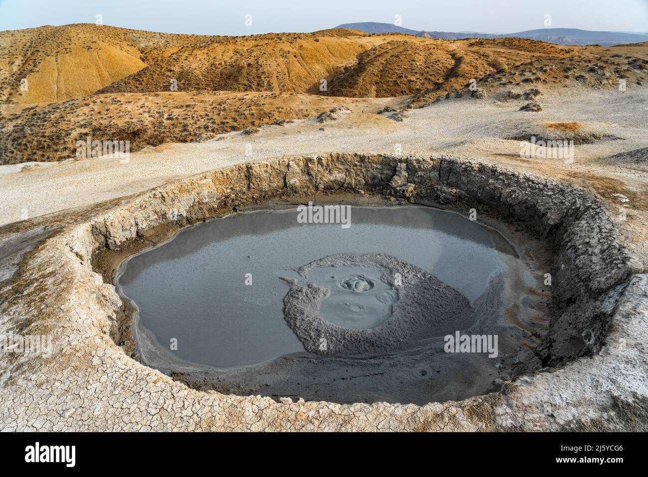 Large active mud volcano crater Stock Photo - Alamy