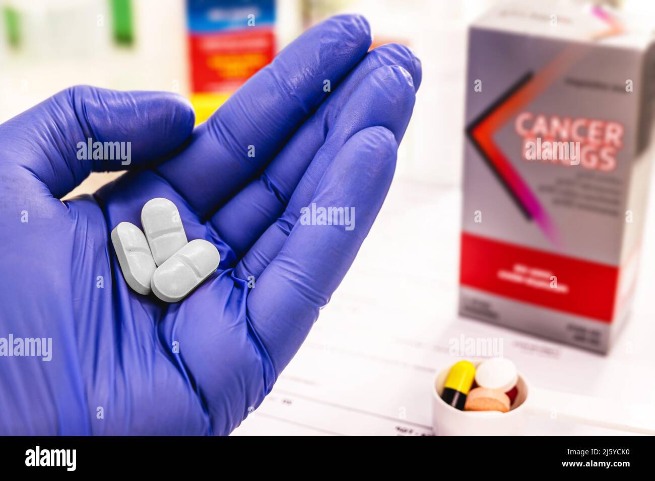 drug or medicine used against cancer in the hand of a doctor or ...