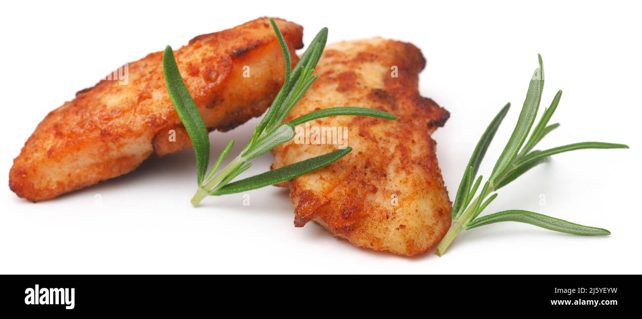 Fried chicken with rosemary over white background Stock Photo - Alamy