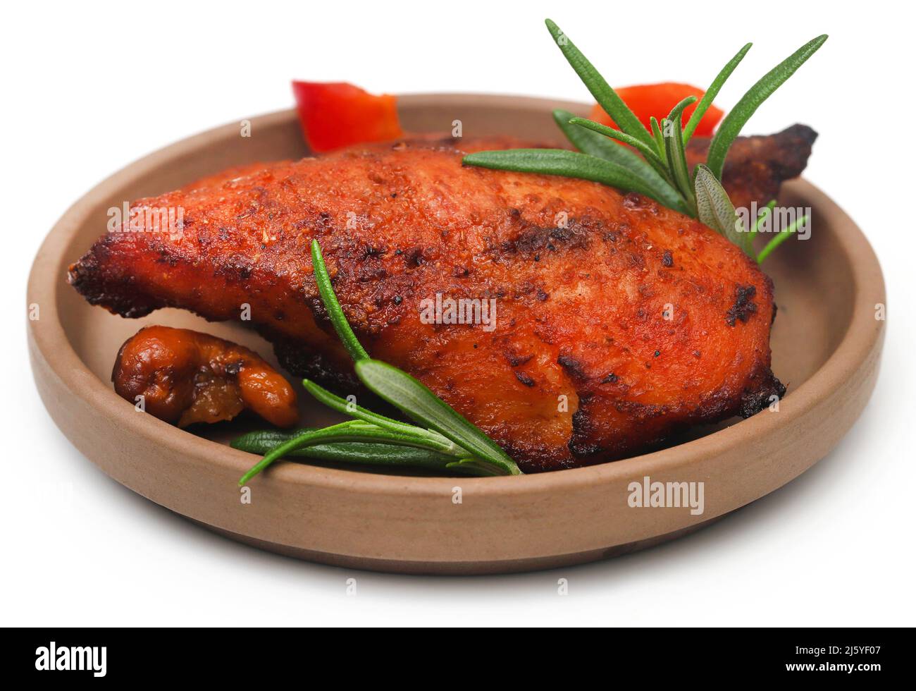 Fried chicken with rosemary over white background Stock Photo - Alamy