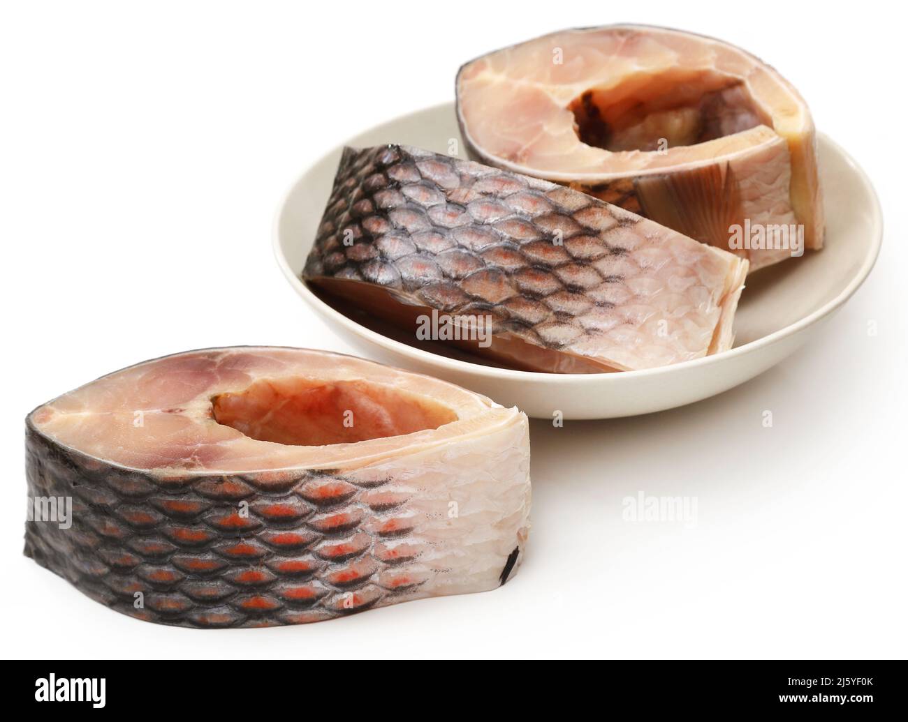 Popular rohu fish sliced over white background Stock Photo - Alamy