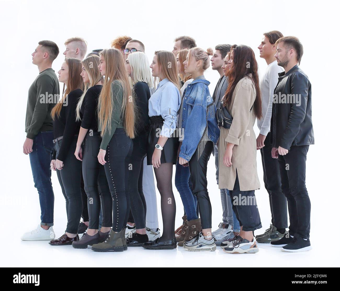 side view. an organized group of young people. isolated on white ...