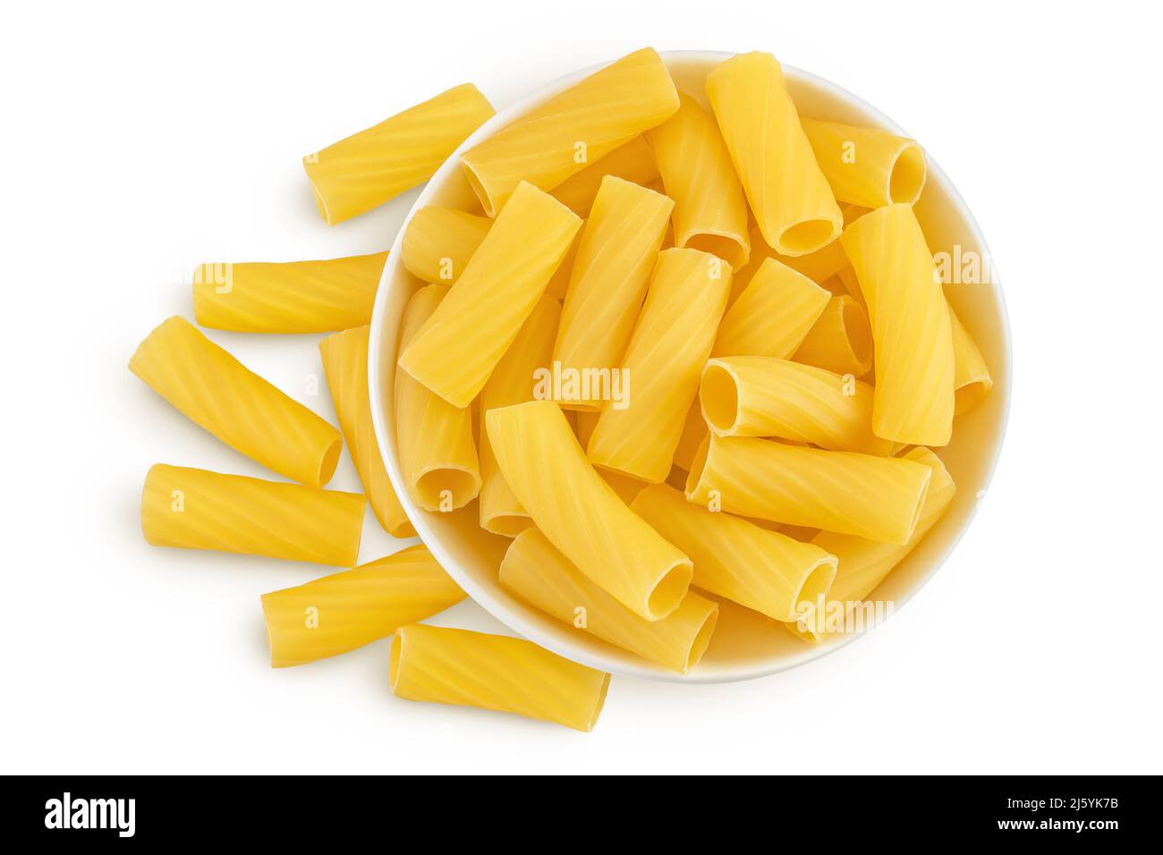 raw italian Rigatoni pasta in ceramic bowl isolated on white background ...