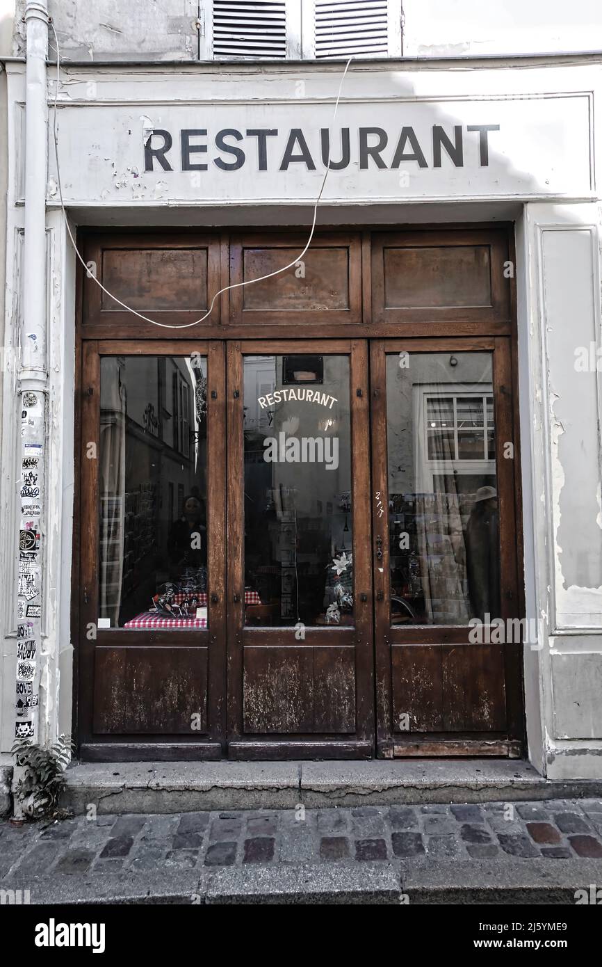 Entrance with old wooden doors of a bohemian restaurant Stock Photo - Alamy