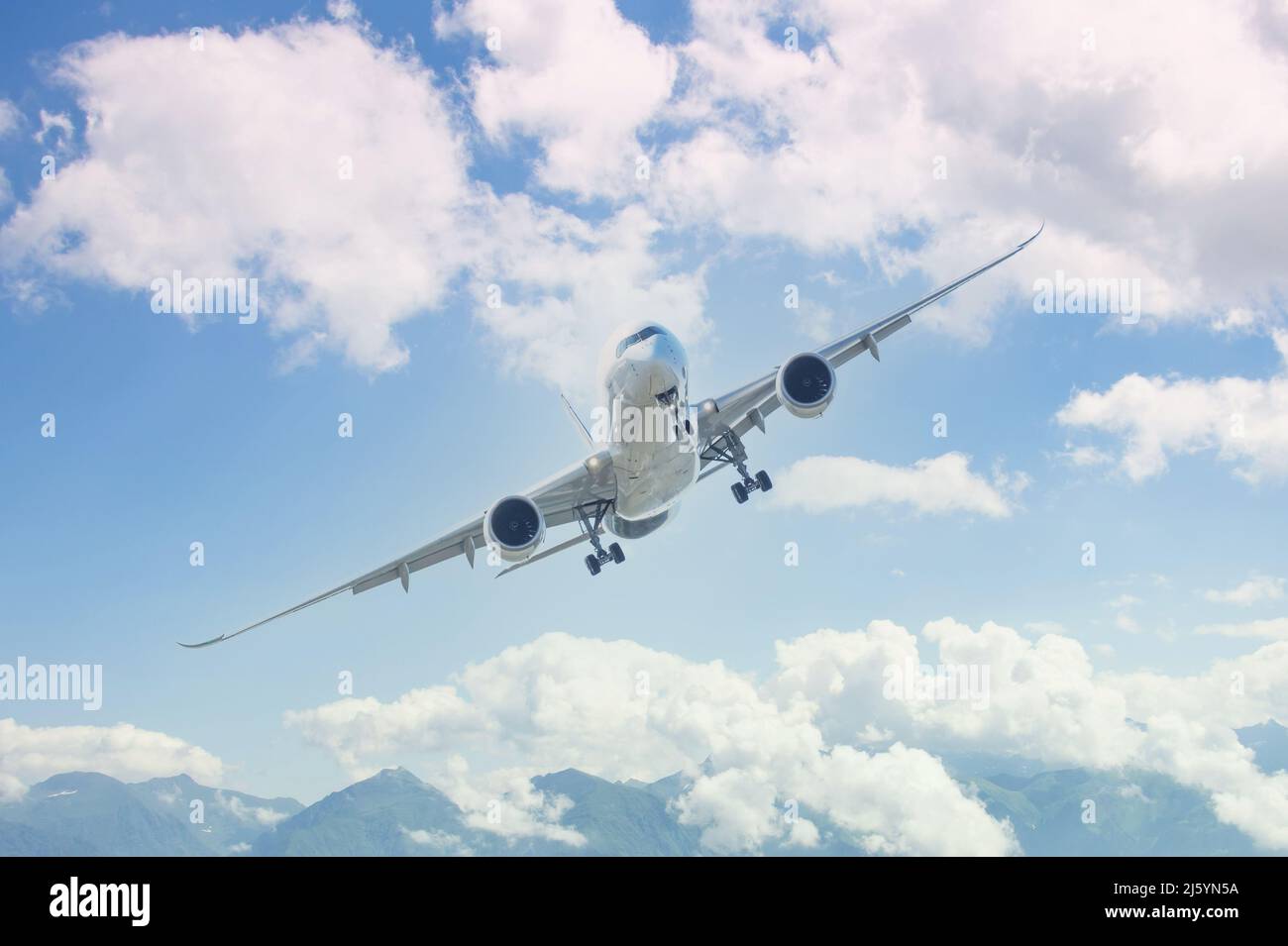 Landing approach of an aircraft with extended landing gear turning in ...