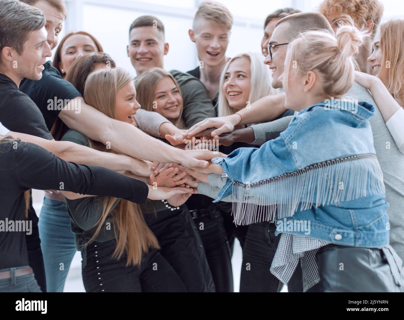 close up. a group of young people showing their unity. the concept of ...