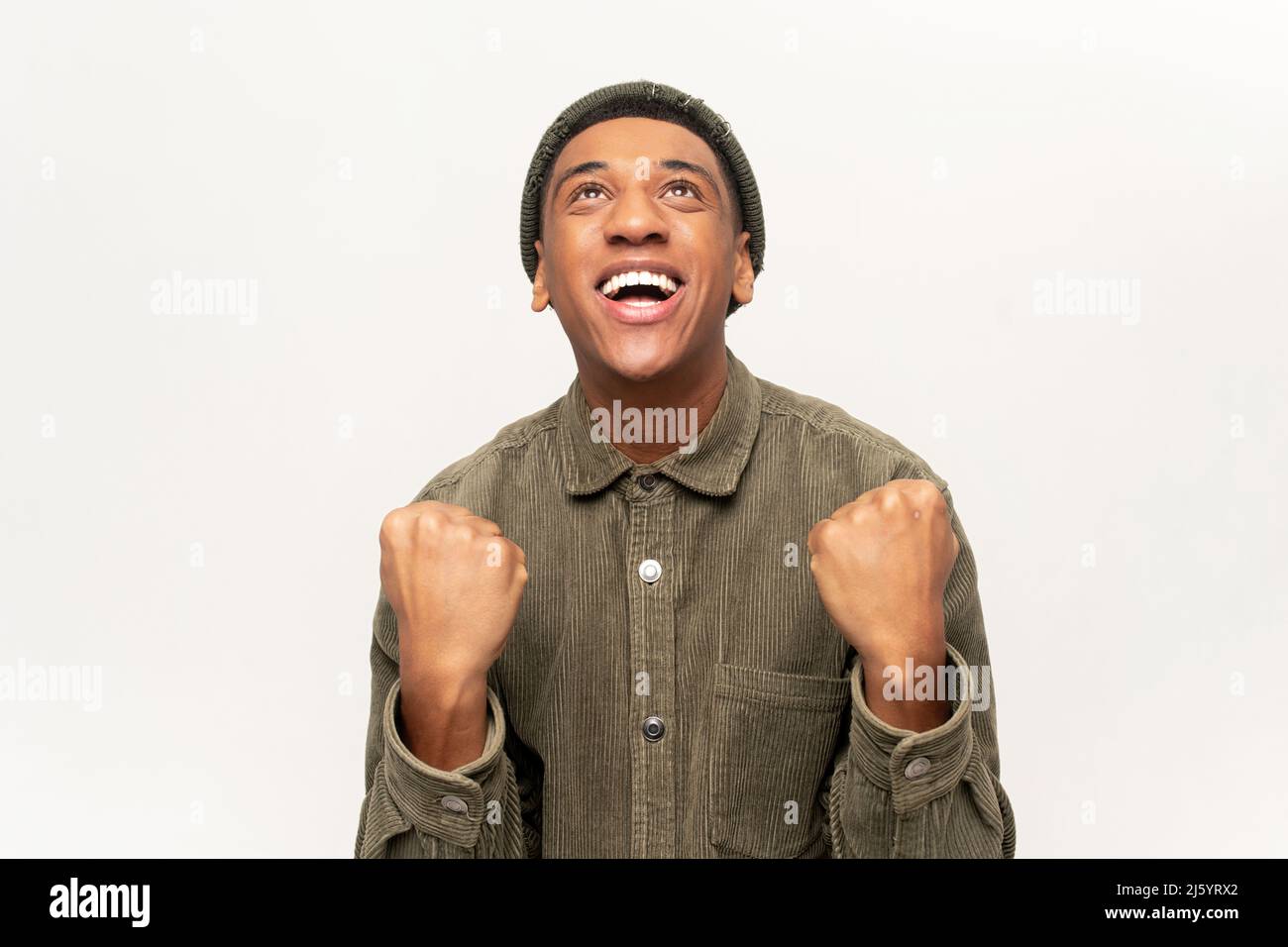 Extremely excited overjoyed man shouting making yes gesture, amazed ...