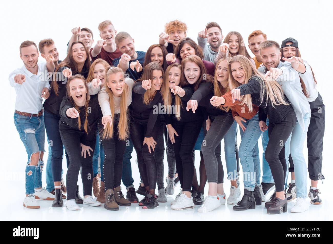 in full growth. a group of happy young people pointing at you Stock ...