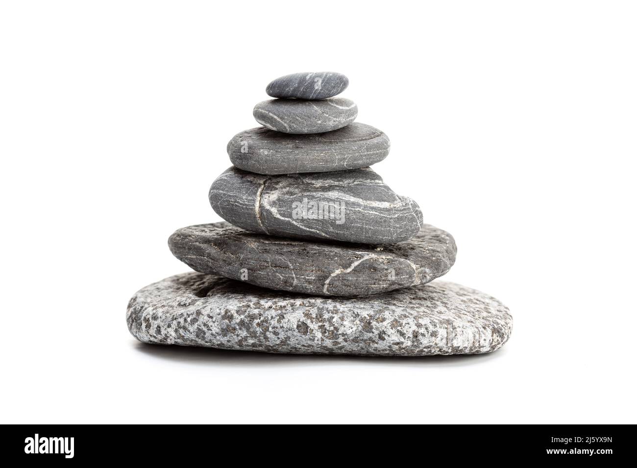 Balanced Stones isolated on white background. Balancing Pebbles. Life ...