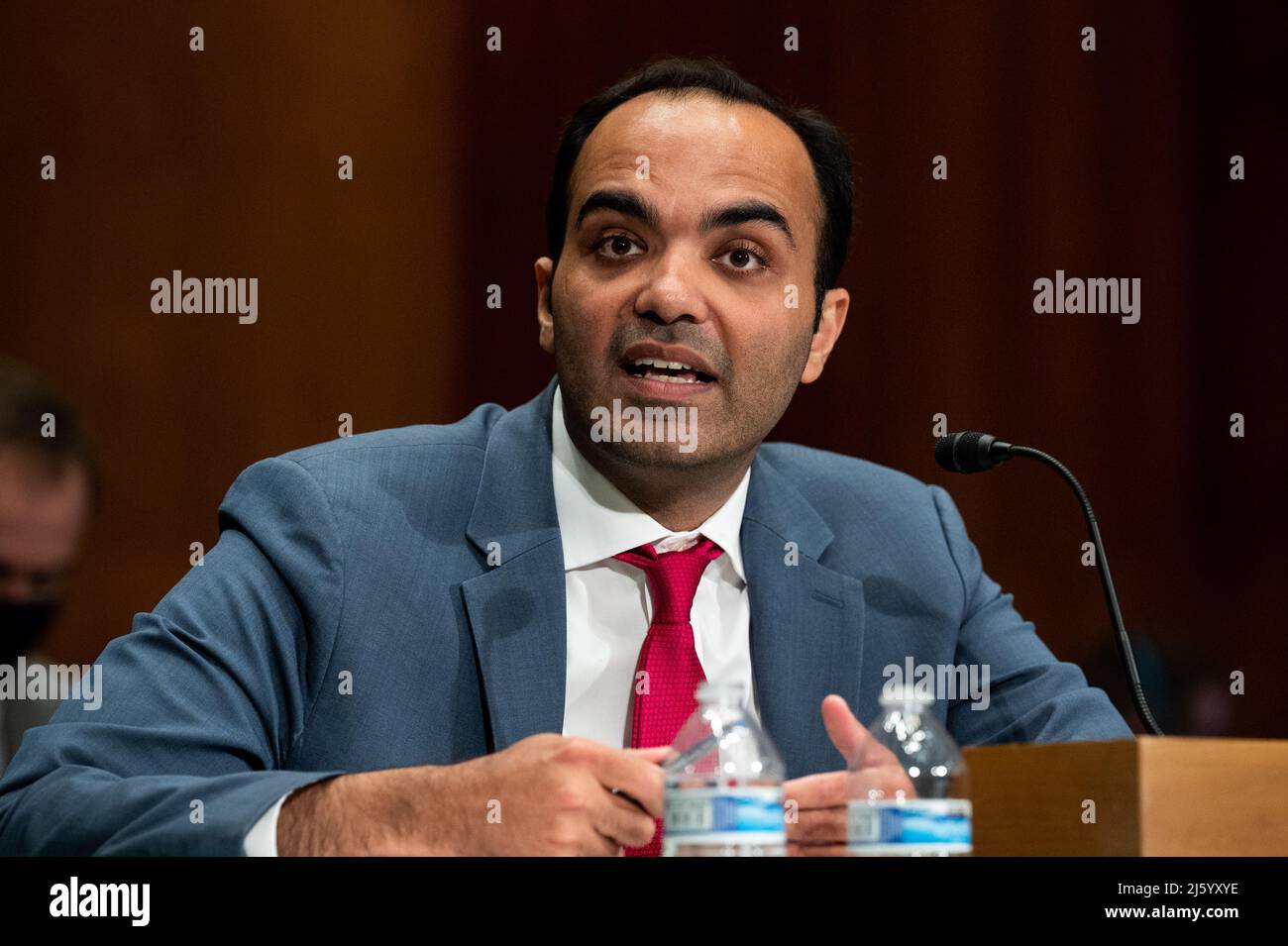 Rohit Chopra, Director, Consumer Financial Protection Bureau, speaking ...