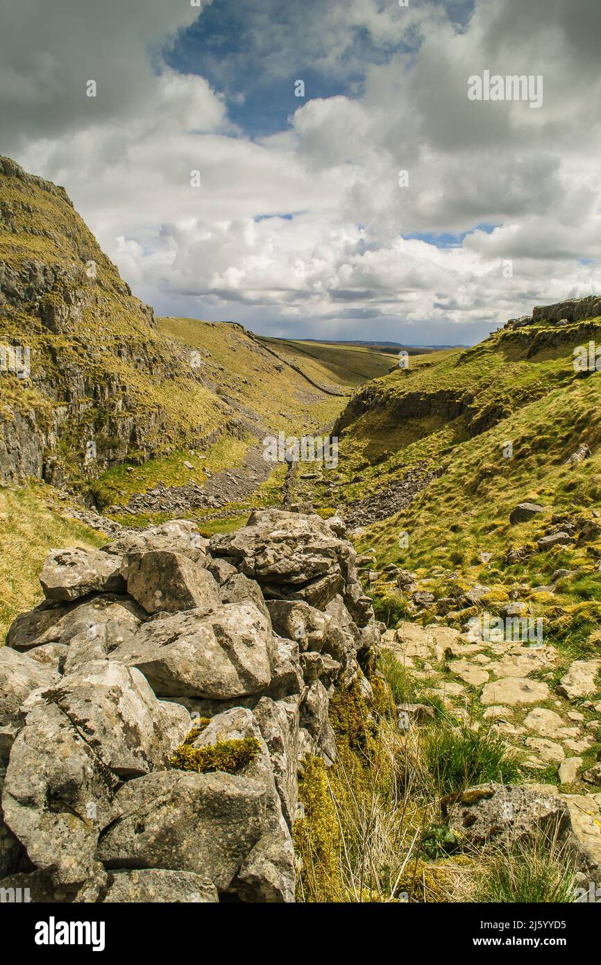 View looking down the rugged dry valley of Watlowes in the Yorkshire ...