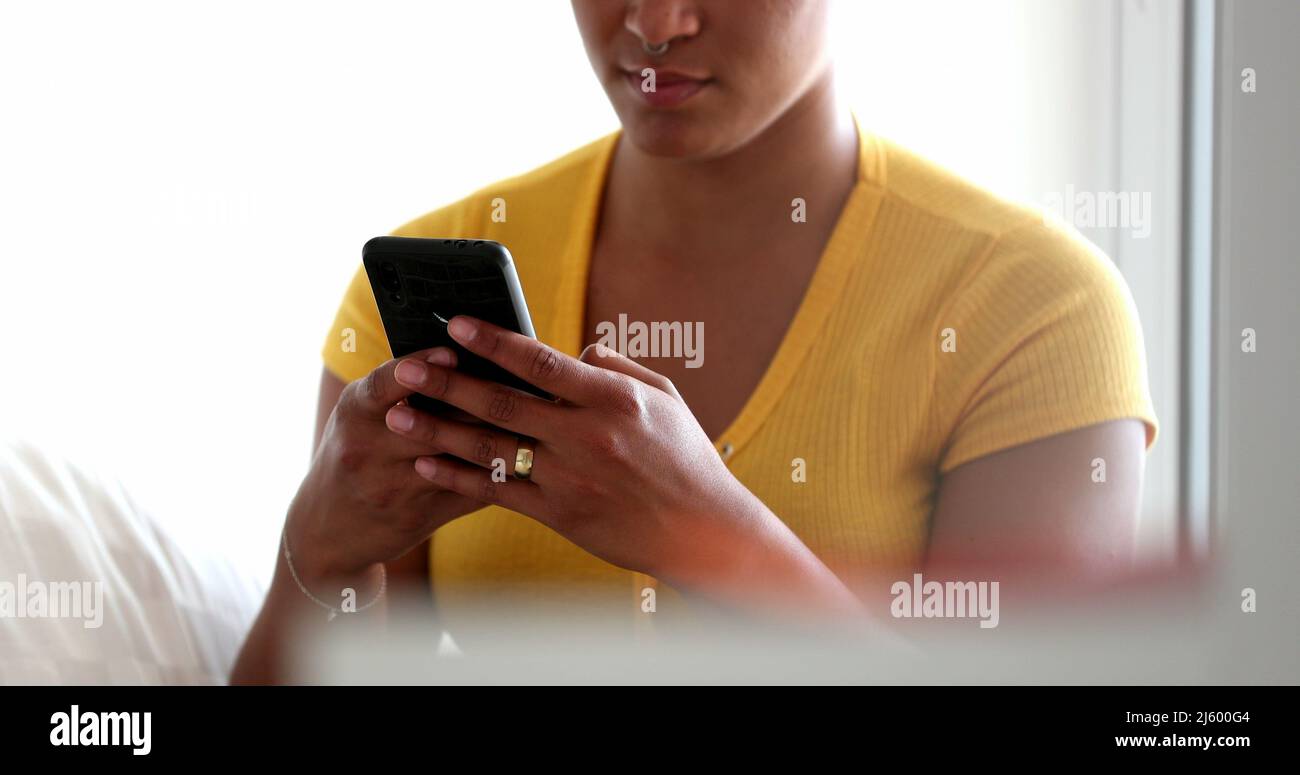 African american woman typing text message, black girl reading message ...