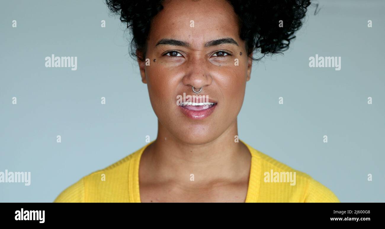 African American woman yelling open mouth to camera Stock Photo - Alamy