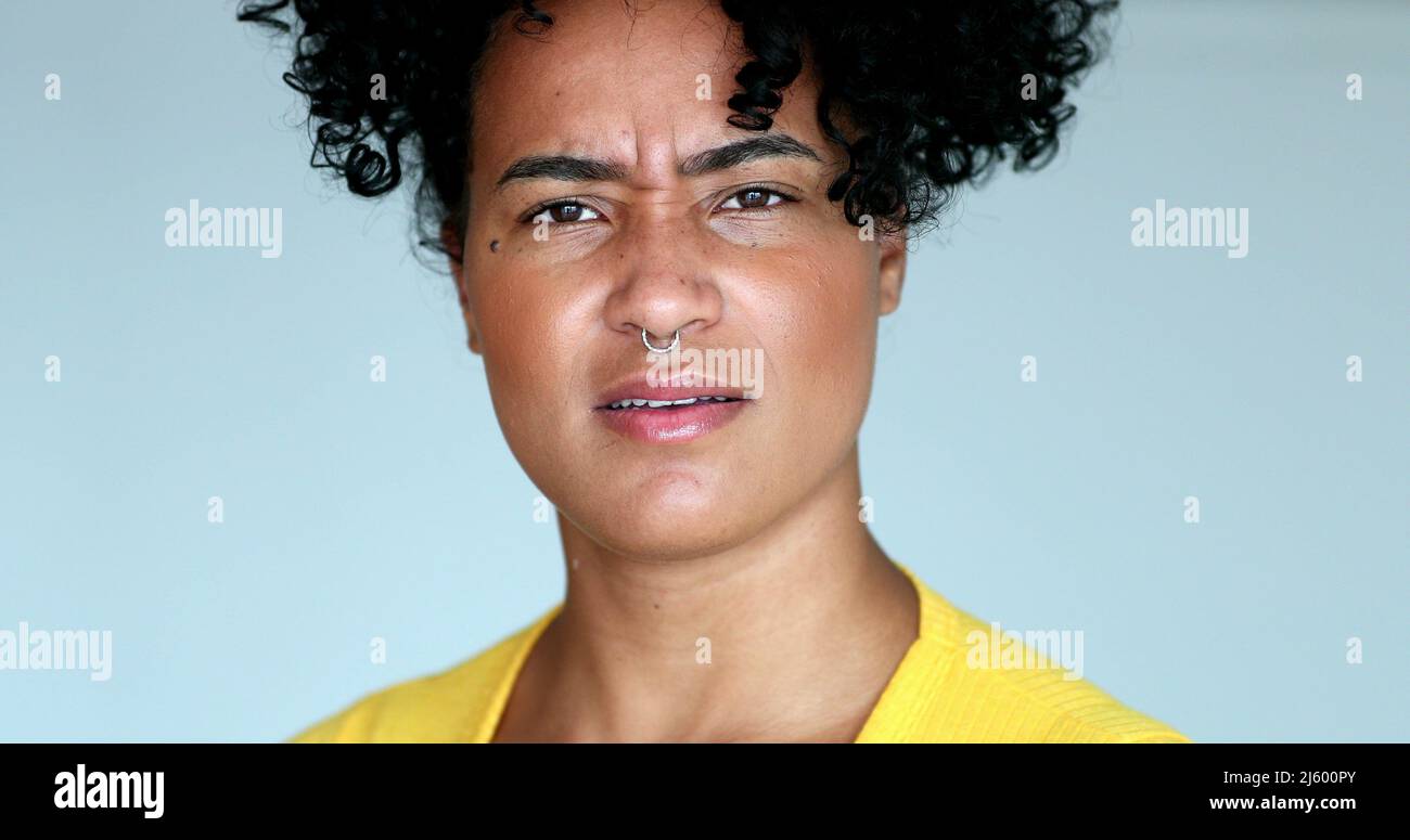 Annoyed african woman emotion reaction hi-res stock photography and ...